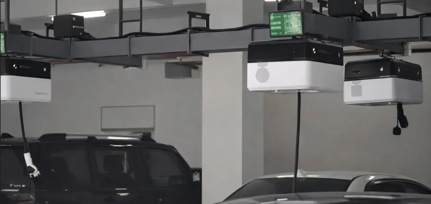 These Chinese robots ride ceiling rails to charge your EV - moomoo ...